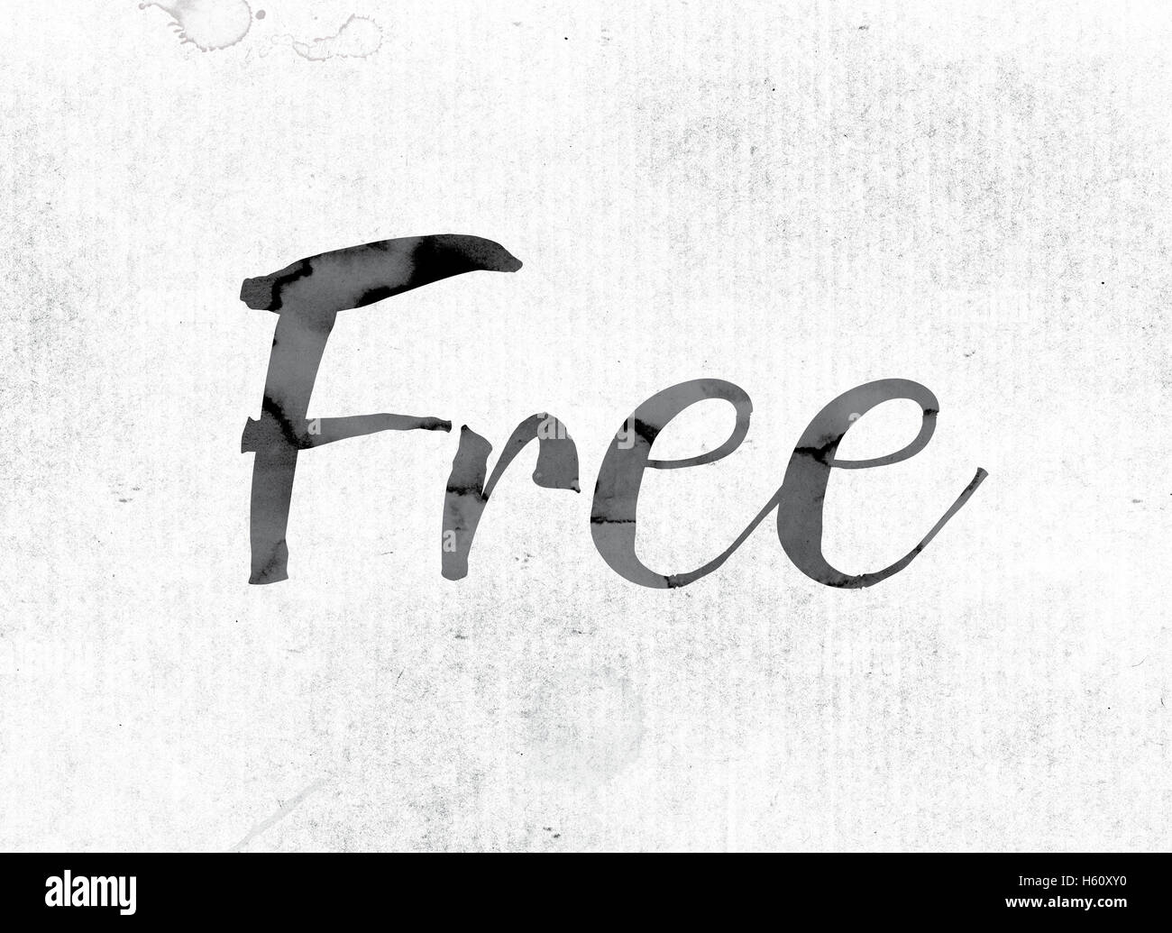 The word "Free" concept and theme painted in watercolor ink on a white ...