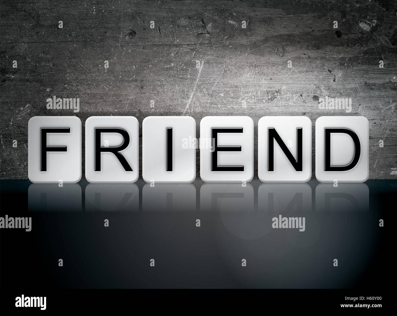 The word "Friend" written in white tiles against a dark vintage grunge ...