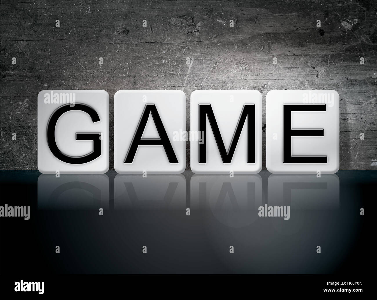 The word "Game" written in white tiles against a dark vintage grunge ...