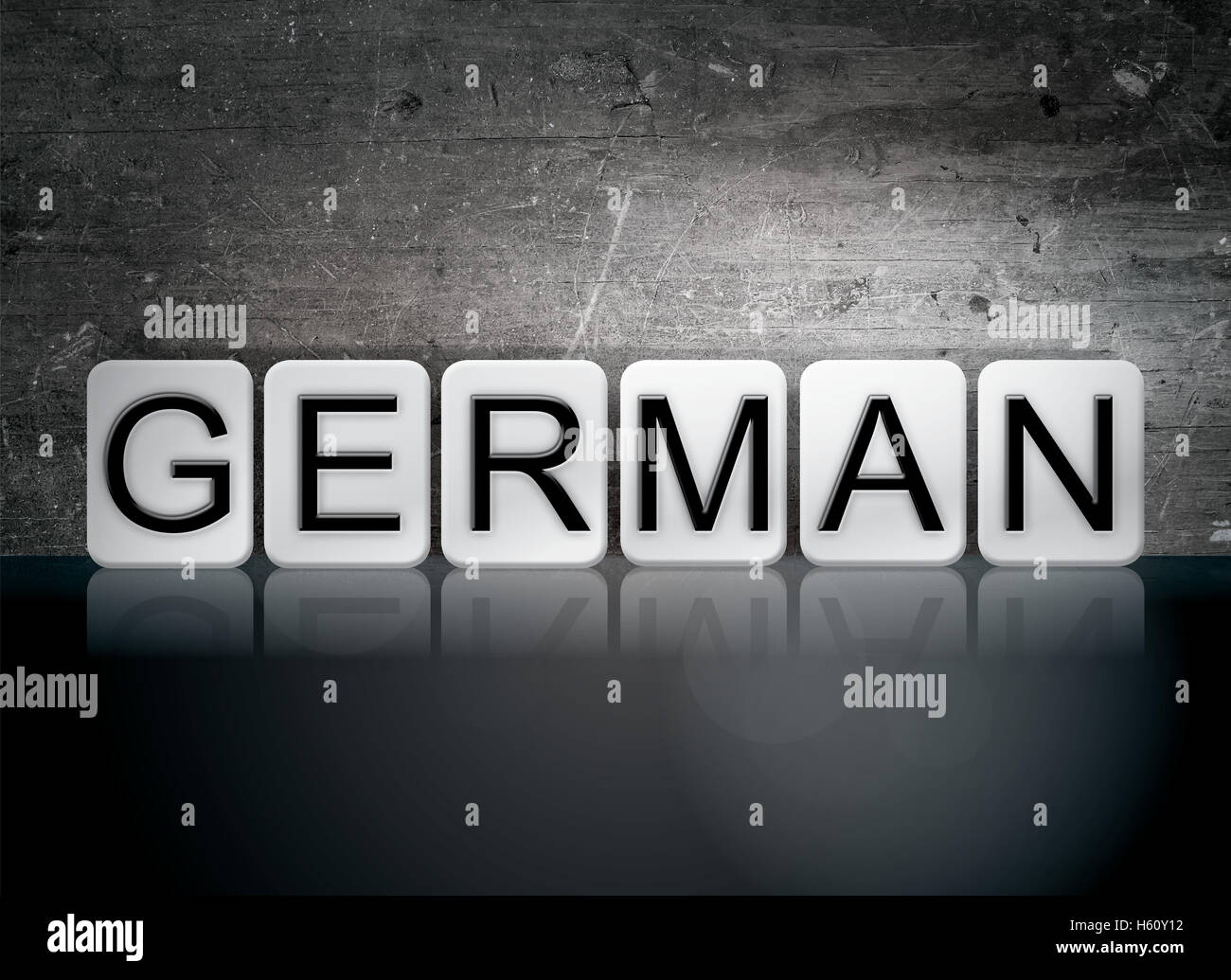 The word "German" written in white tiles against a dark vintage grunge ...