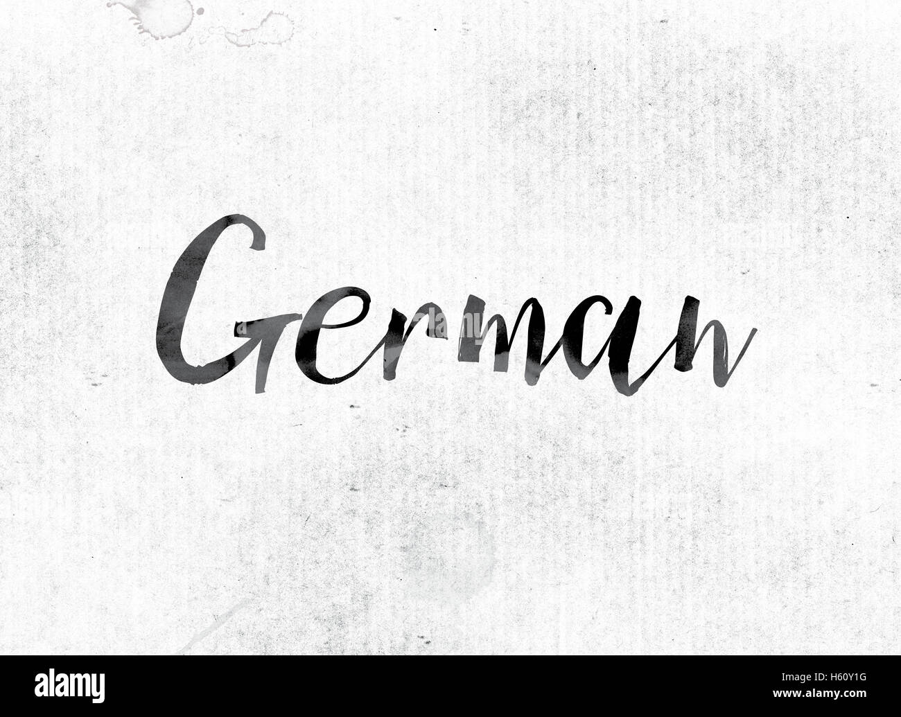The word "German" concept and theme painted in watercolor ink on a ...