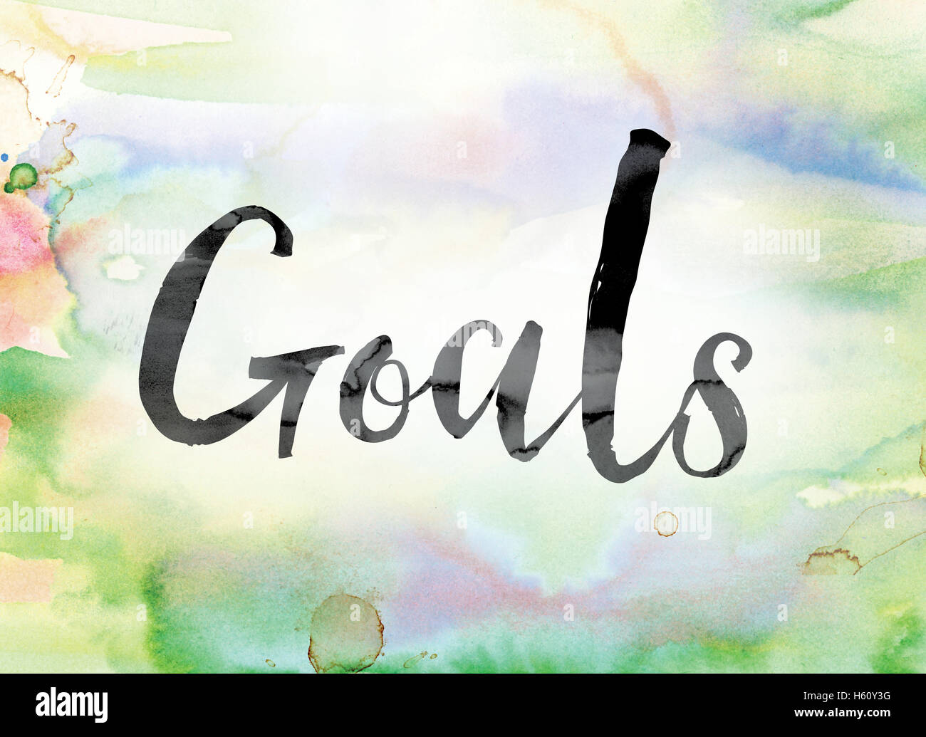 The word "Goals" painted in black ink over a colorful watercolor washed ...