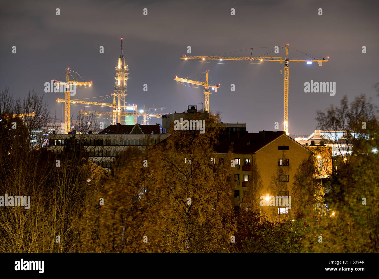 Bridge cranes in the night at Pasila construction site, Helsinki ...