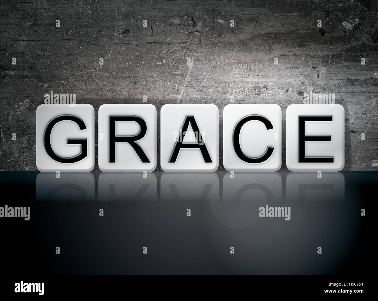 The word "Grace" written in white tiles against a dark vintage grunge ...