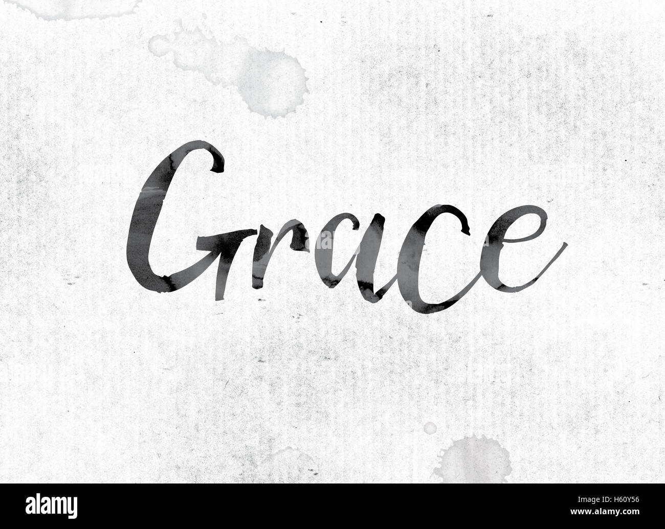 The word "Grace" concept and theme painted in watercolor ink on a white ...
