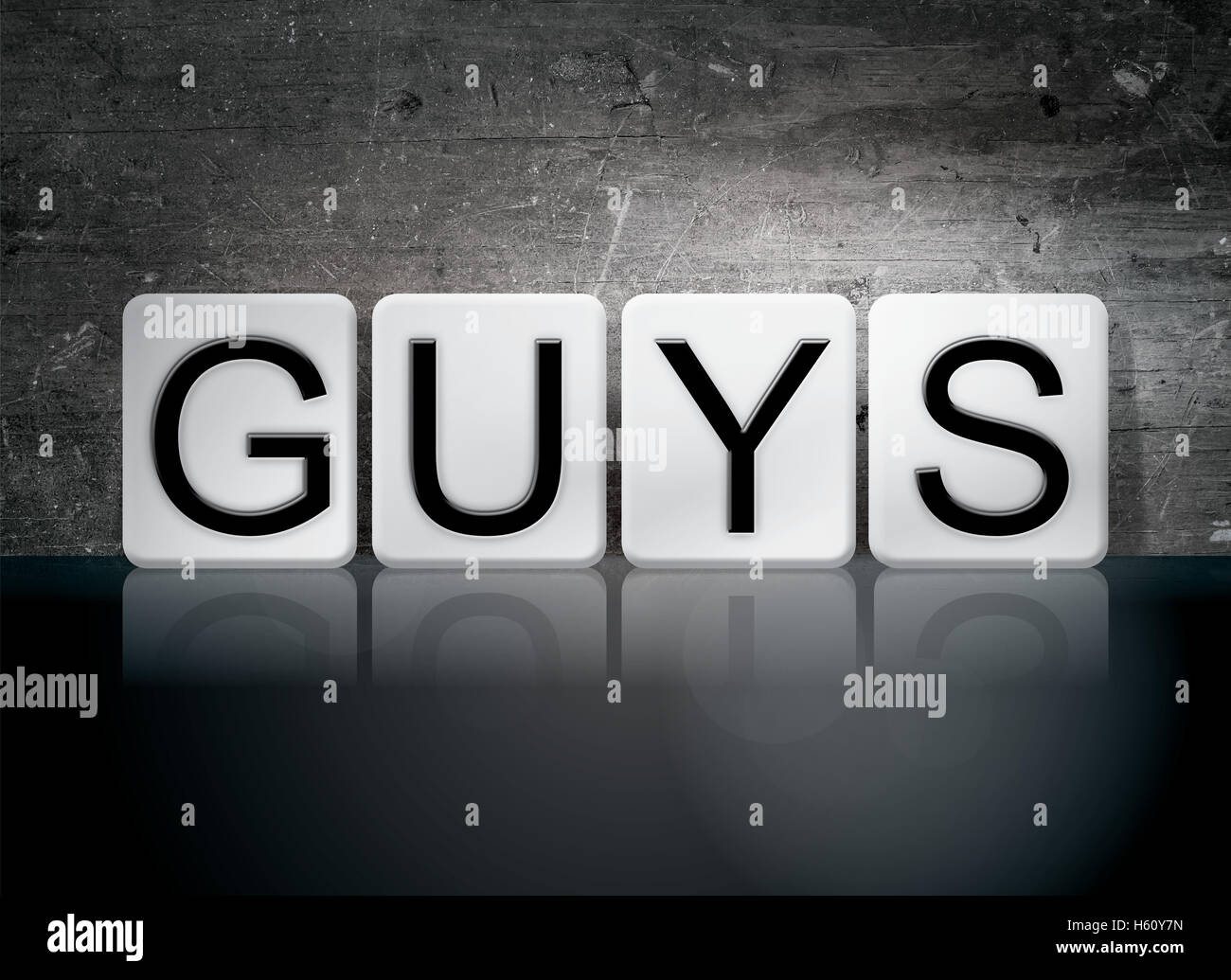 The word "Guys" written in white tiles against a dark vintage grunge ...