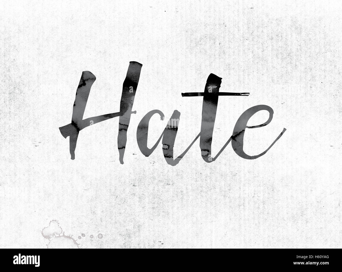 The word "Hate" concept and theme painted in watercolor ink on a white ...