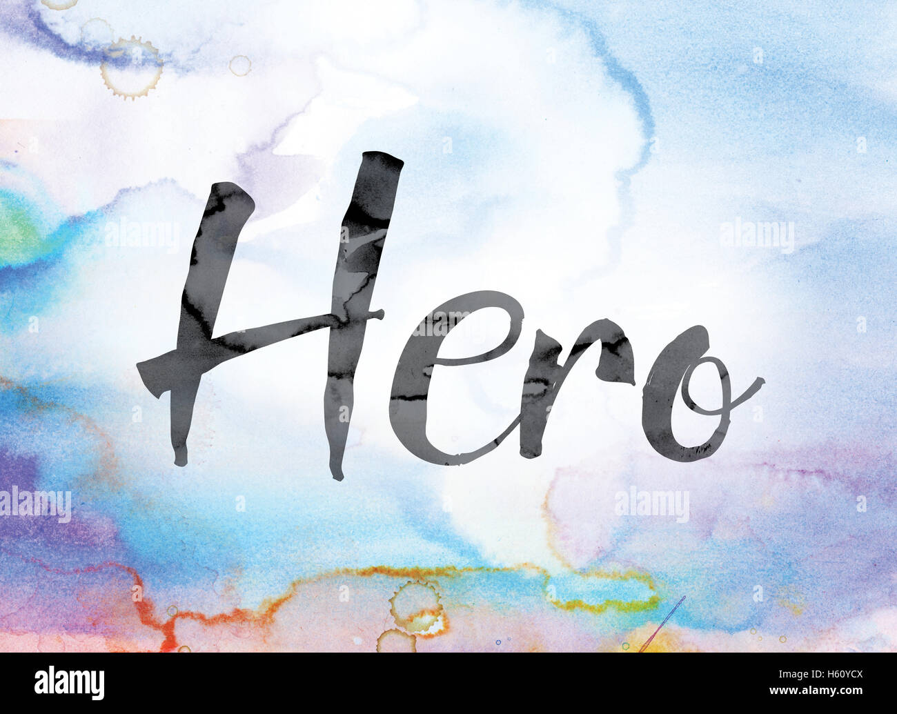 The word "Hero" painted in black ink over a colorful watercolor washed ...