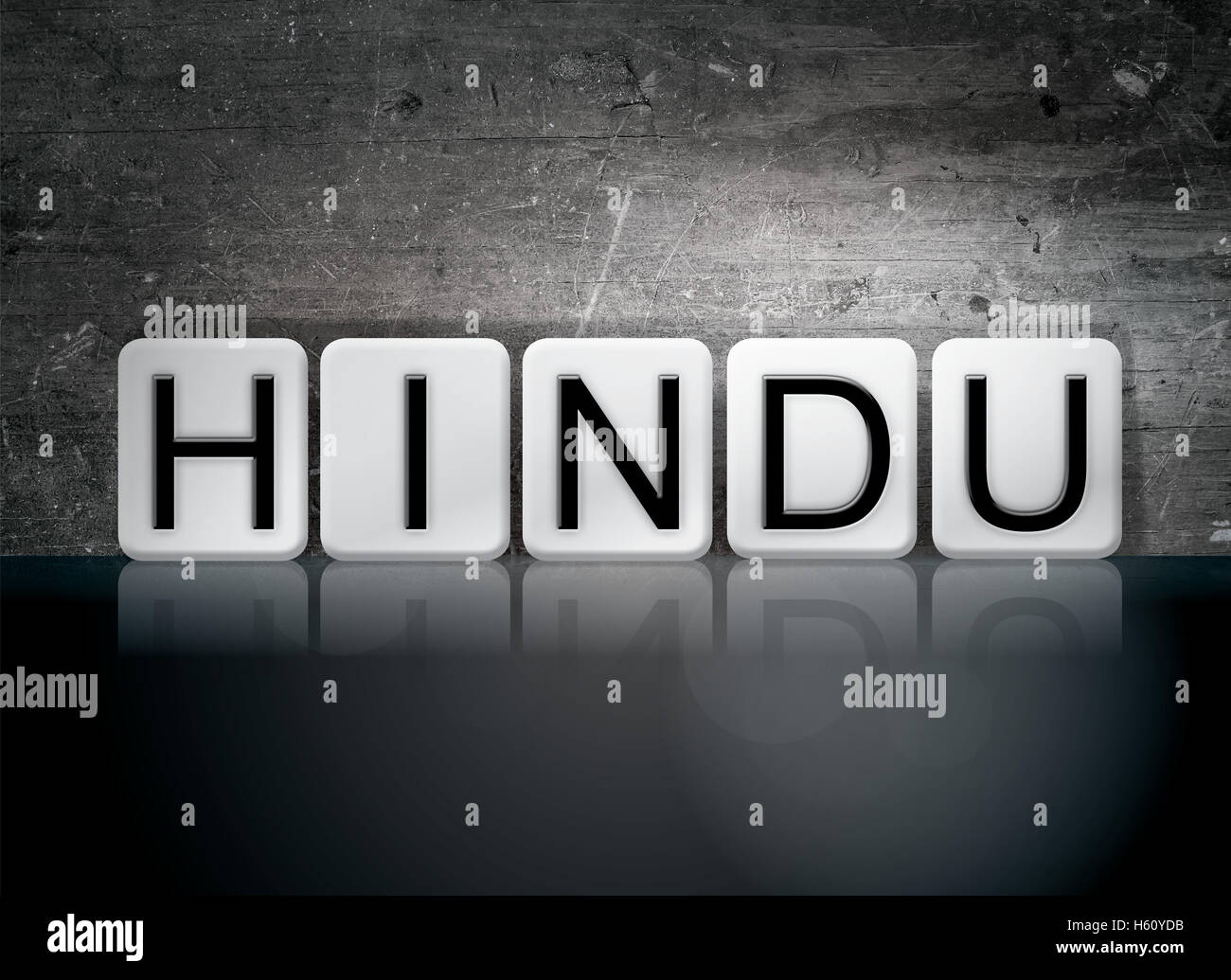 The word "Hindu" written in white tiles against a dark vintage grunge ...