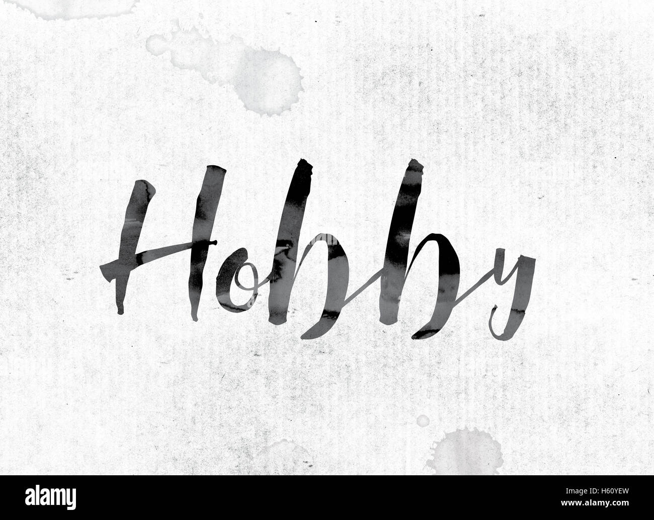 The word "Hobby" concept and theme painted in watercolor ink on a white ...