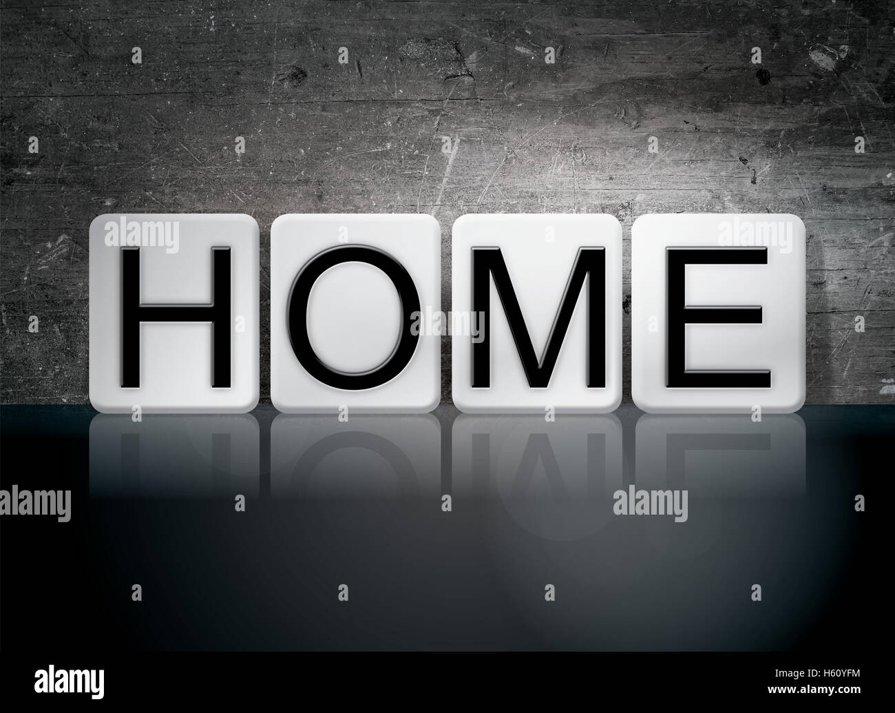 The word "Home" written in white tiles against a dark vintage grunge ...