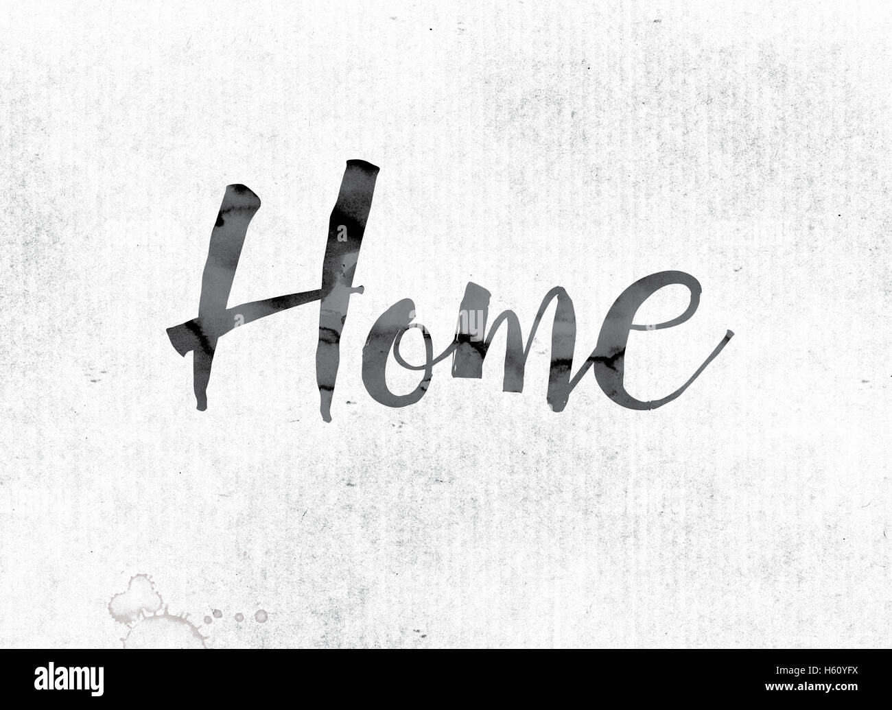 The word "Home" concept and theme painted in watercolor ink on a white ...