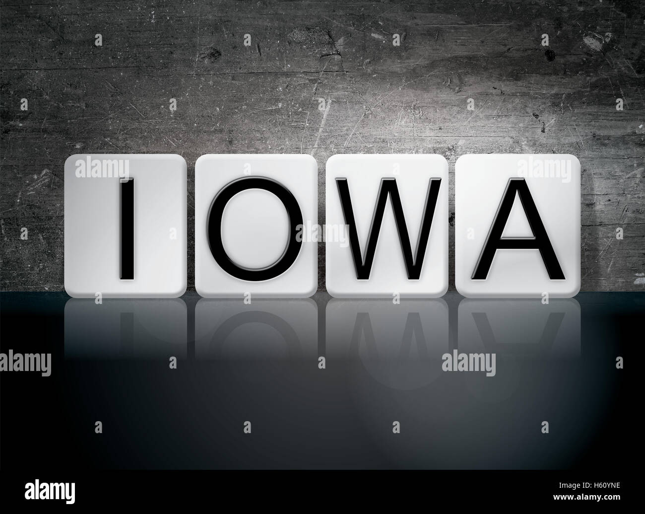 The word "Iowa" written in white tiles against a dark vintage grunge ...
