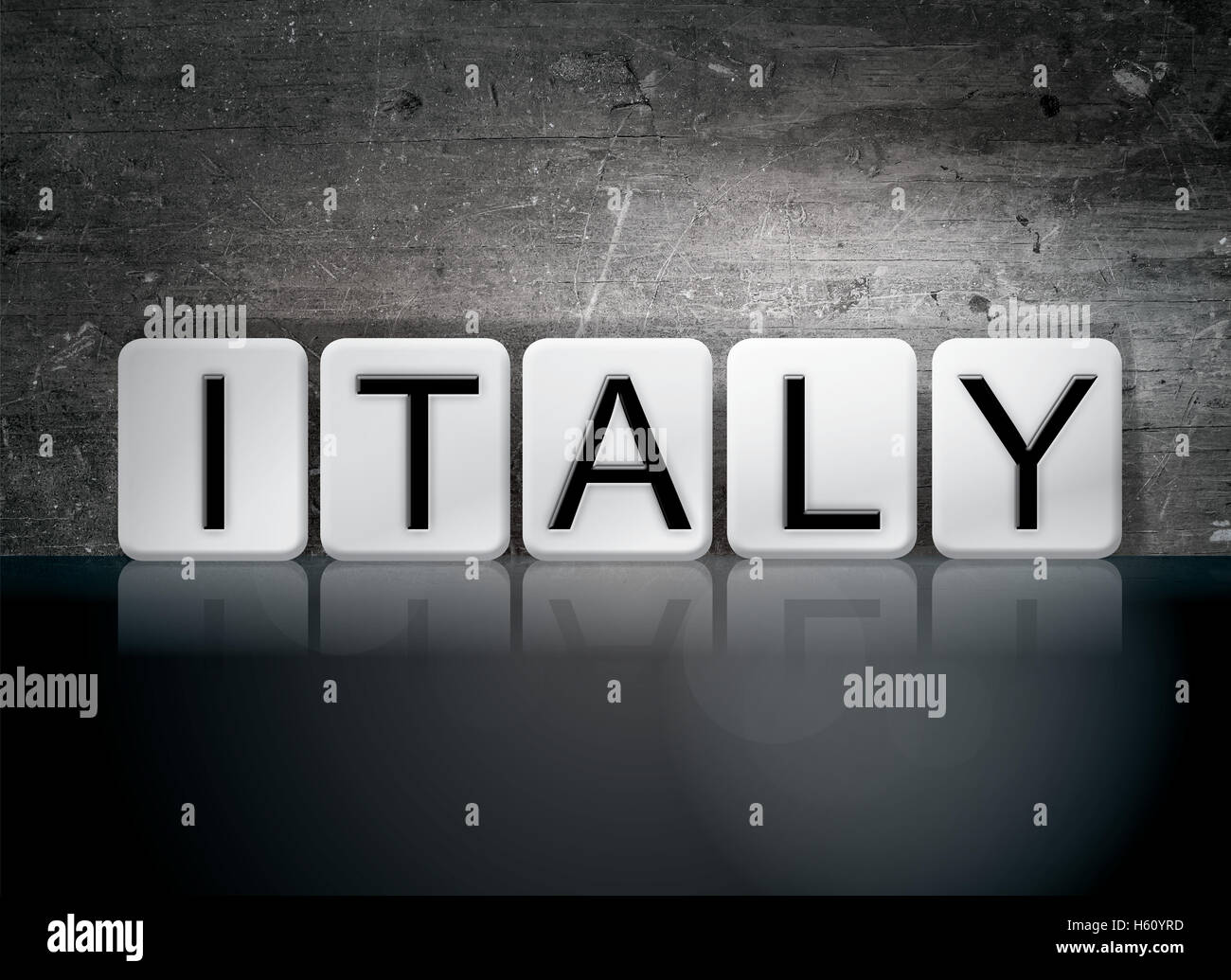 The word "Italy" written in white tiles against a dark vintage grunge ...