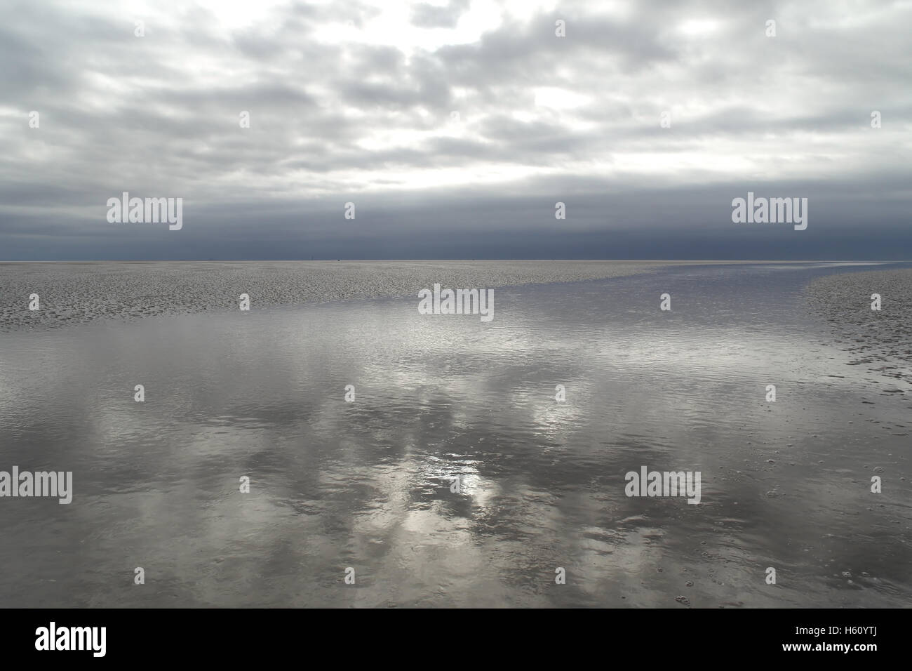 Shallow wide sea water channel foreground view extending right ...