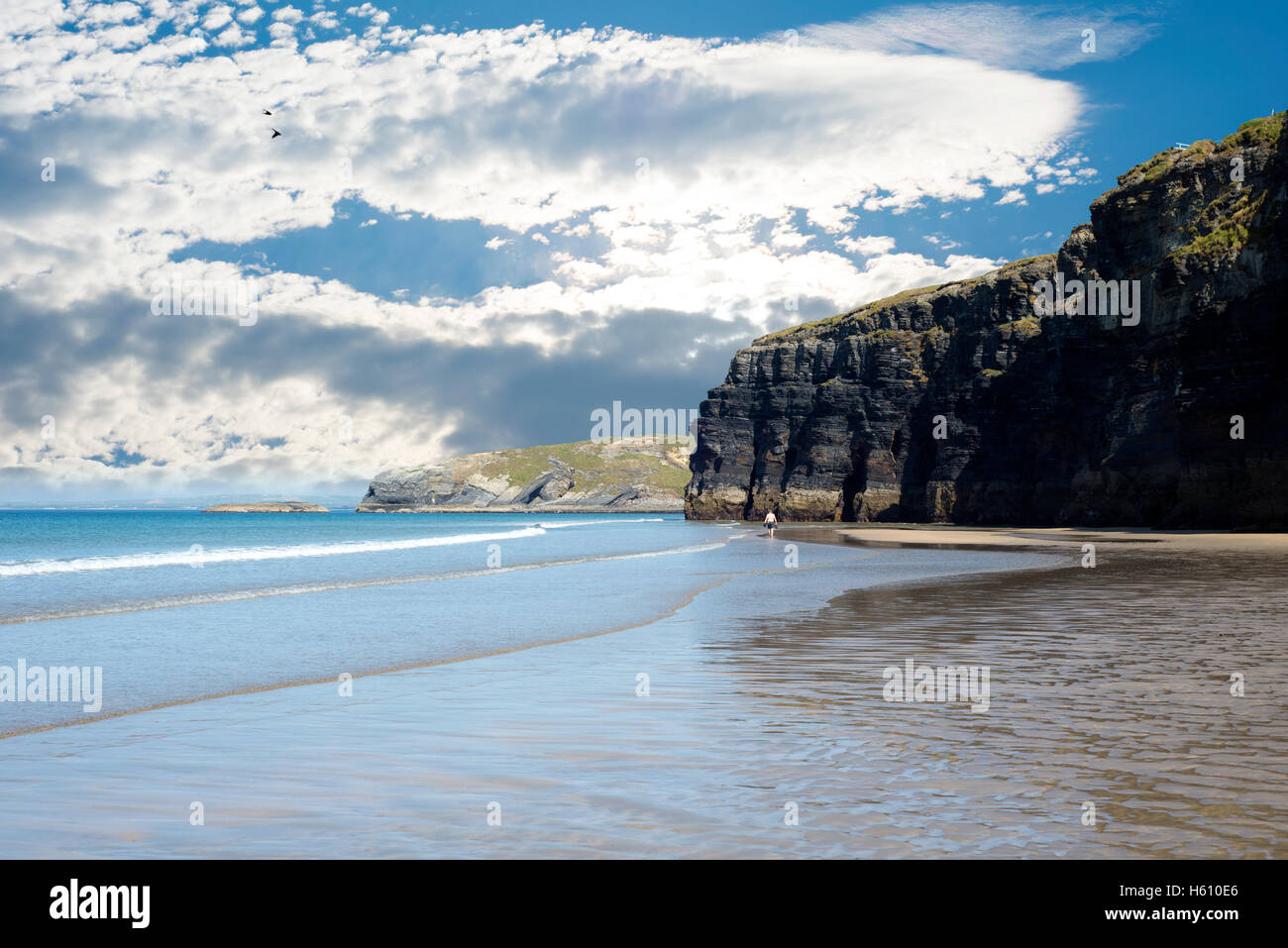 tourists in ballybunion beach and cliffs on the wild atlantic way at ...