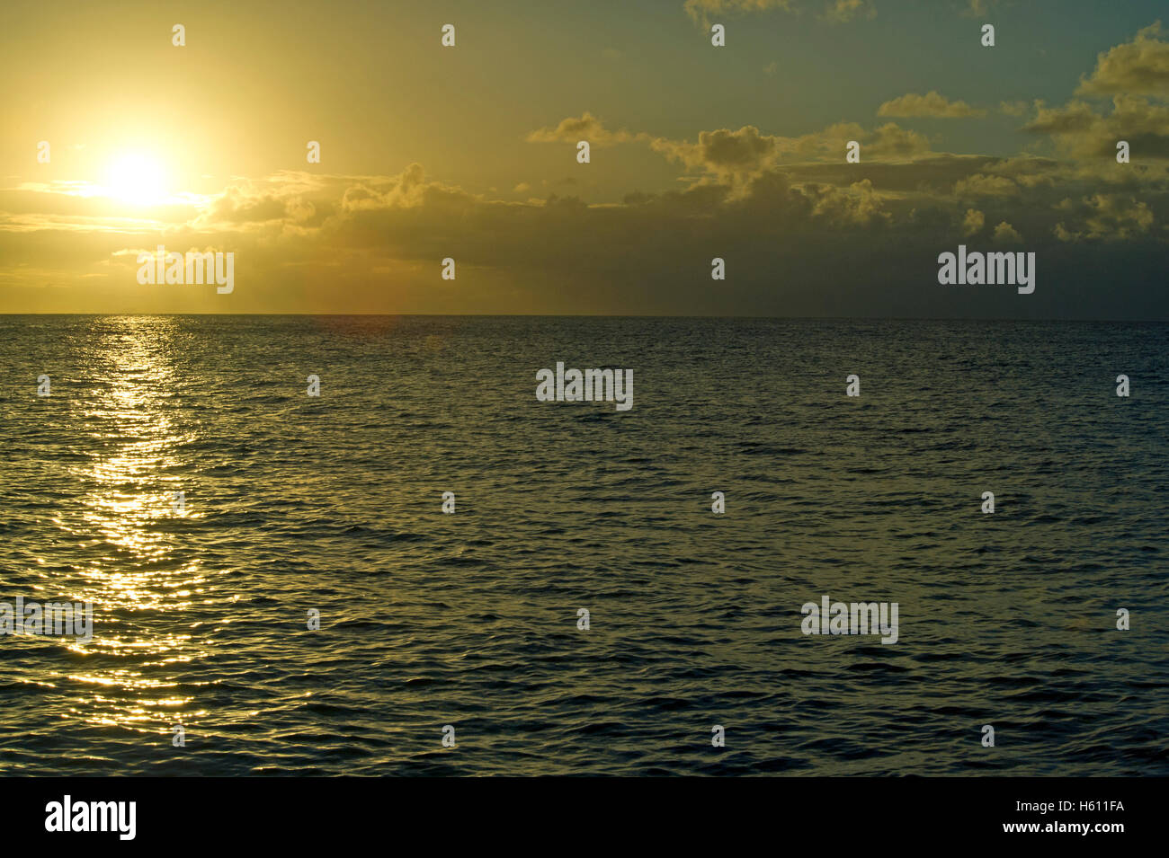 Sunset over Waimea beach on Oahu island, Hawaii Stock Photo - Alamy