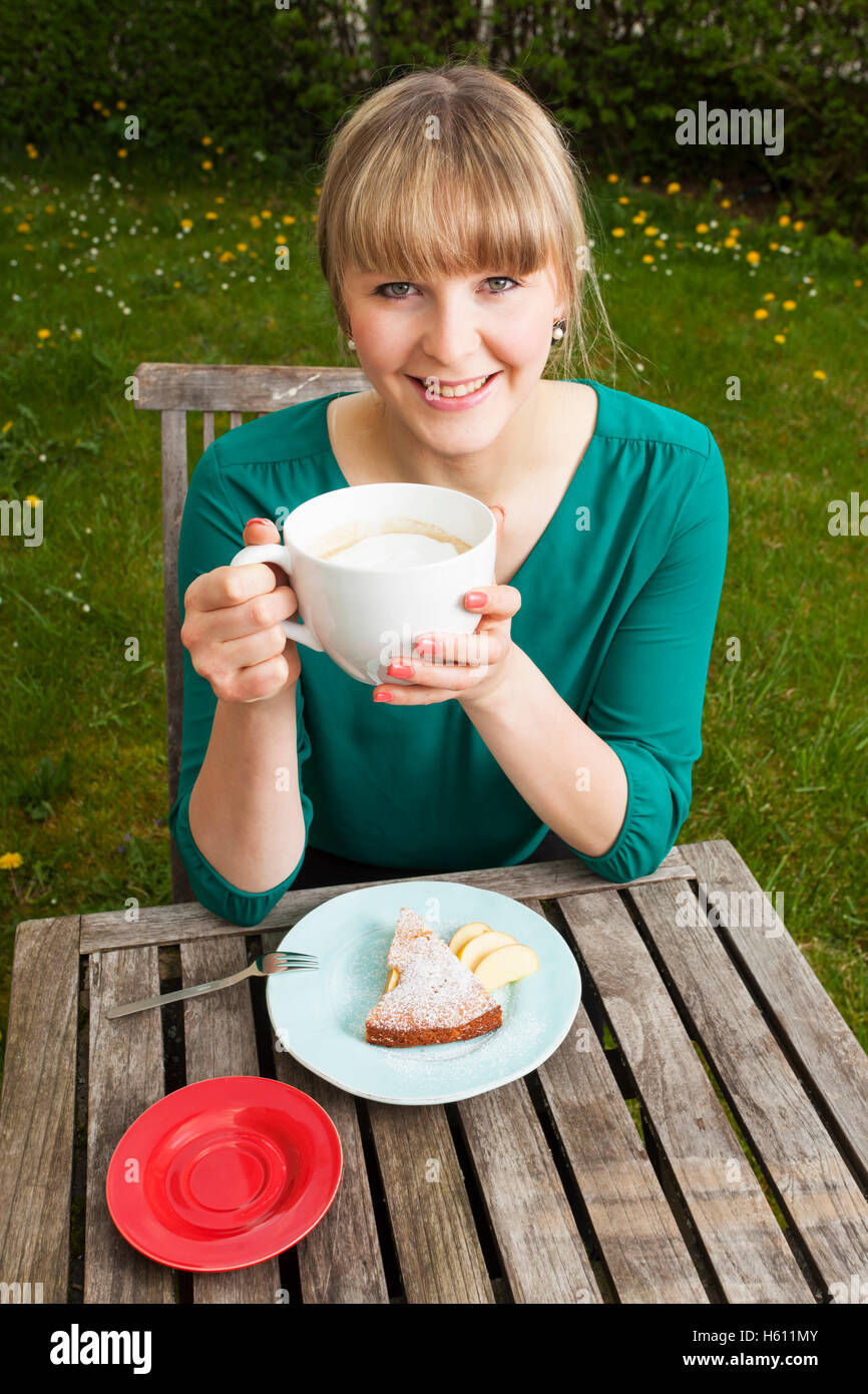 young woman with coffee Stock Photo - Alamy