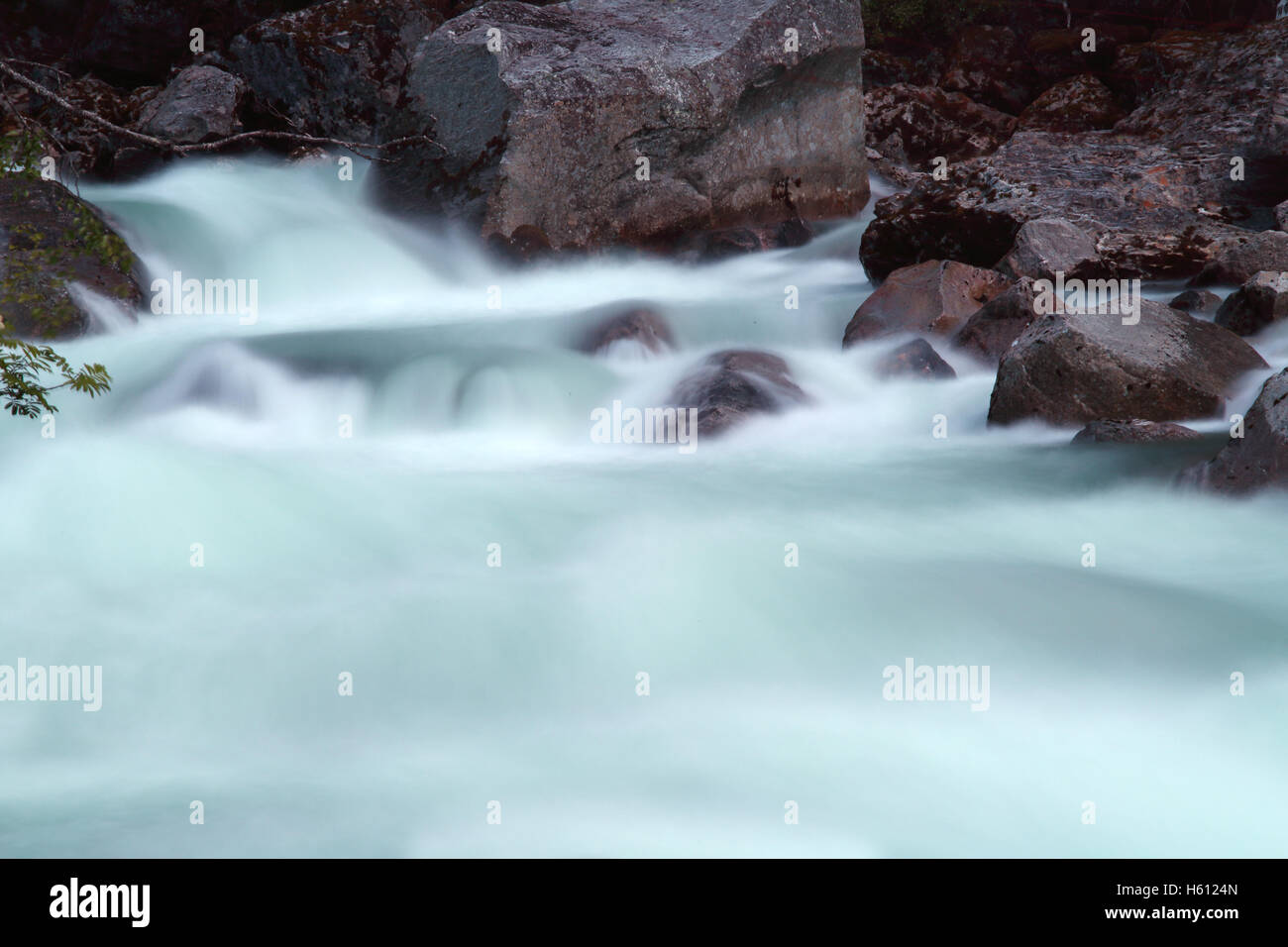 Fast flowing water in river rapids, long exposure Stock Photo - Alamy