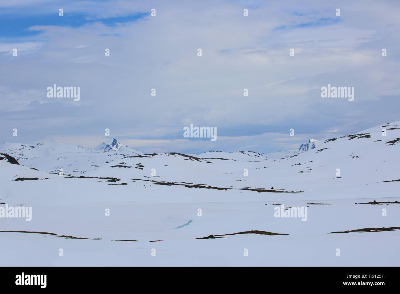 Spring Norway landscape with mountaind and valley with melting snow ...