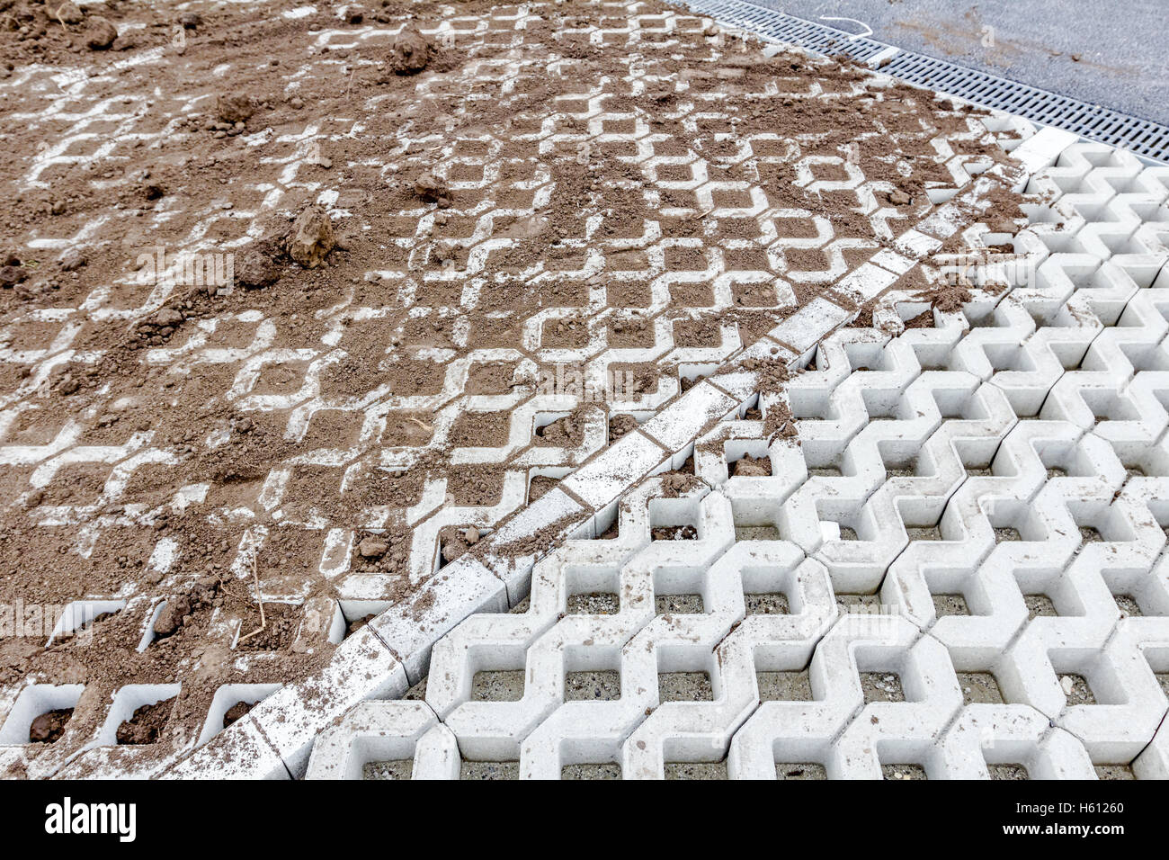 Leveling and filling out symmetrical and decorative precast cobblestone ...