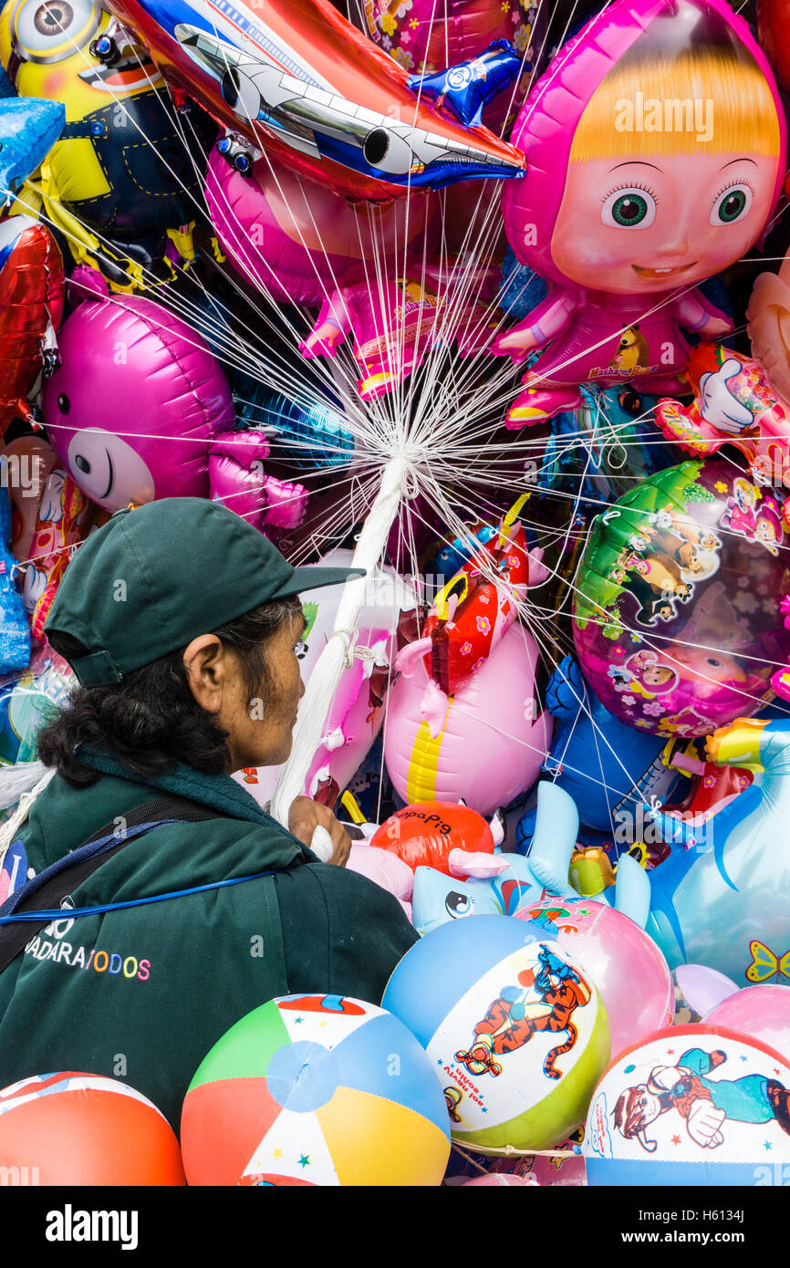 Selling balloons in the historic center of Lima city, Peru Stock Photo ...