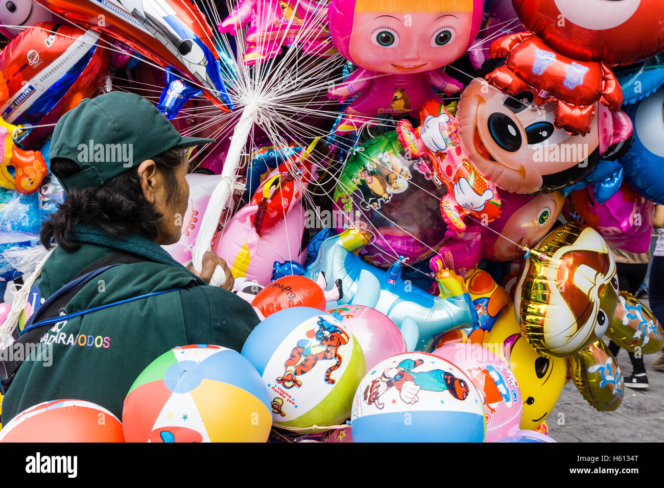 Selling balloons in the historic center of Lima city, Peru Stock Photo ...