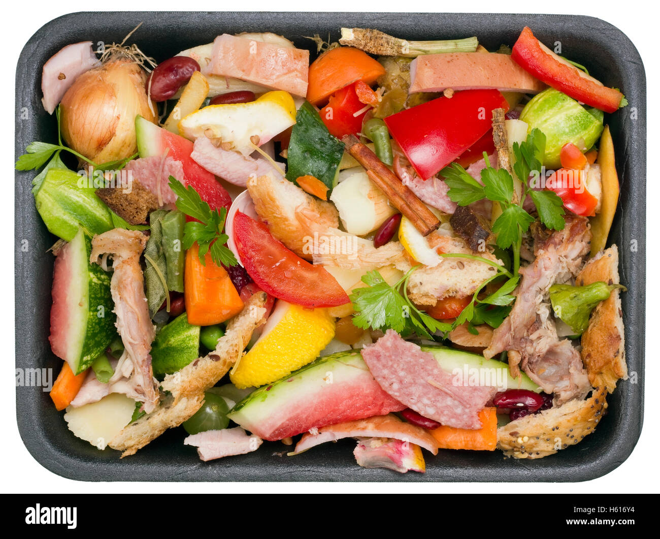 Waste of bad unhealthy food in a plastic black container. Isolated on ...