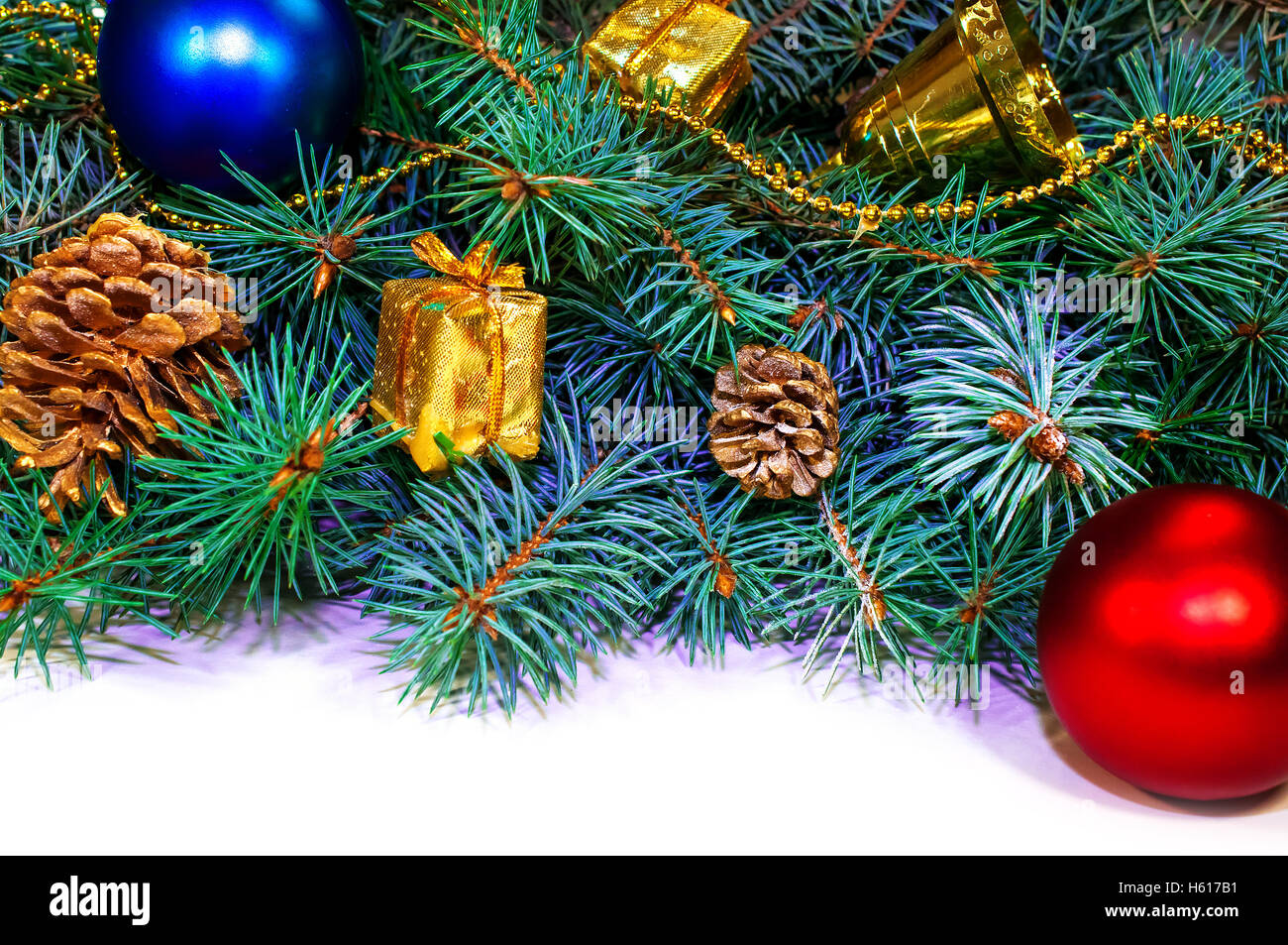 Furry Christmas tree branches with cones Stock Photo - Alamy