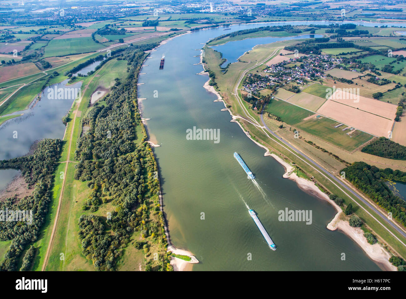 River Rhine, lower Rhine area, freight ships, cargo, flat landscape ...