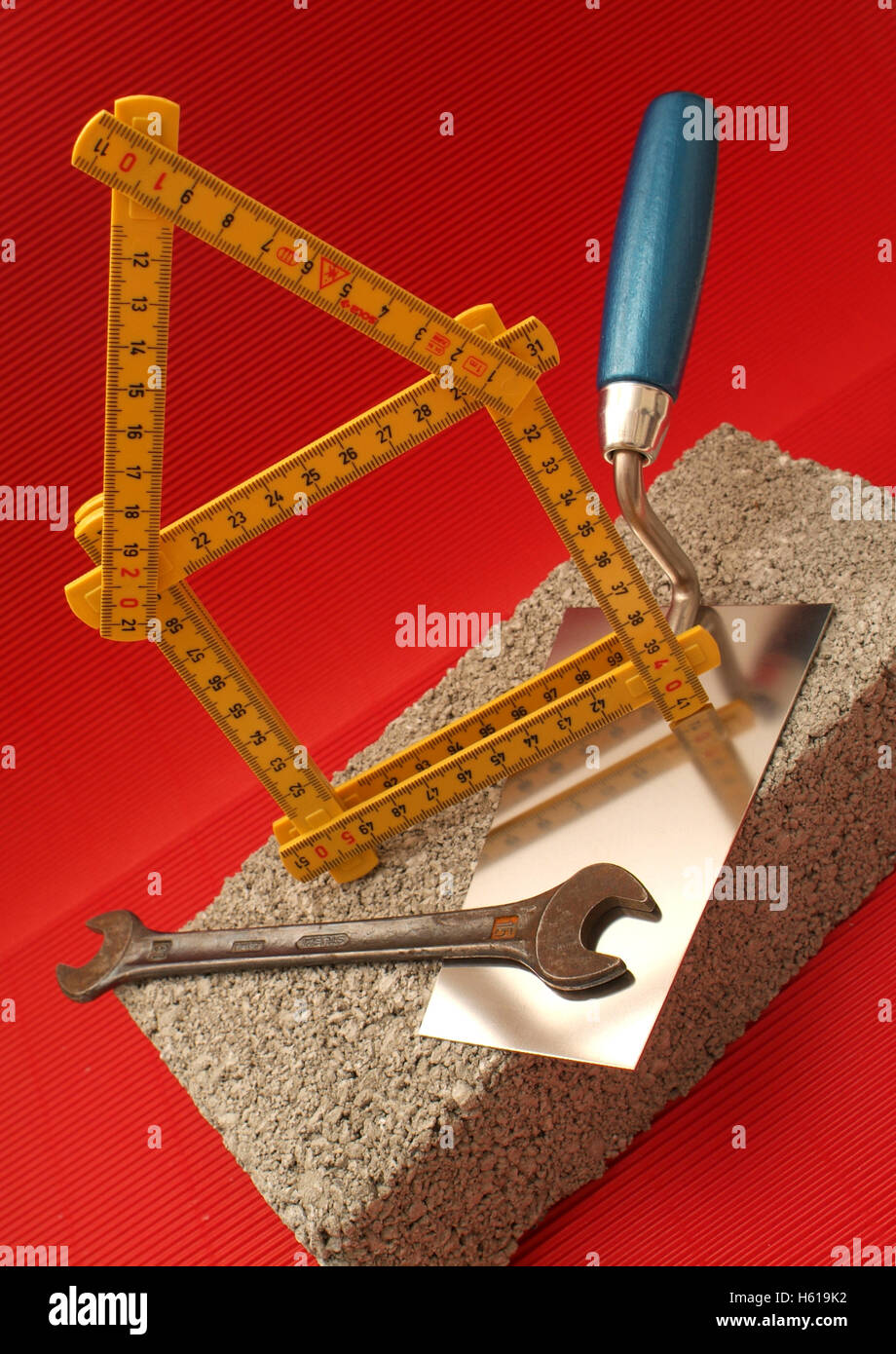 Tools, symbolic for house built Stock Photo - Alamy
