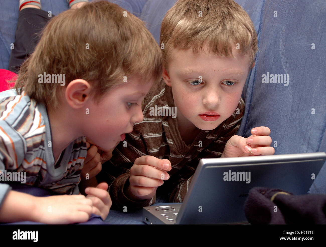 Children with notebook Stock Photo - Alamy