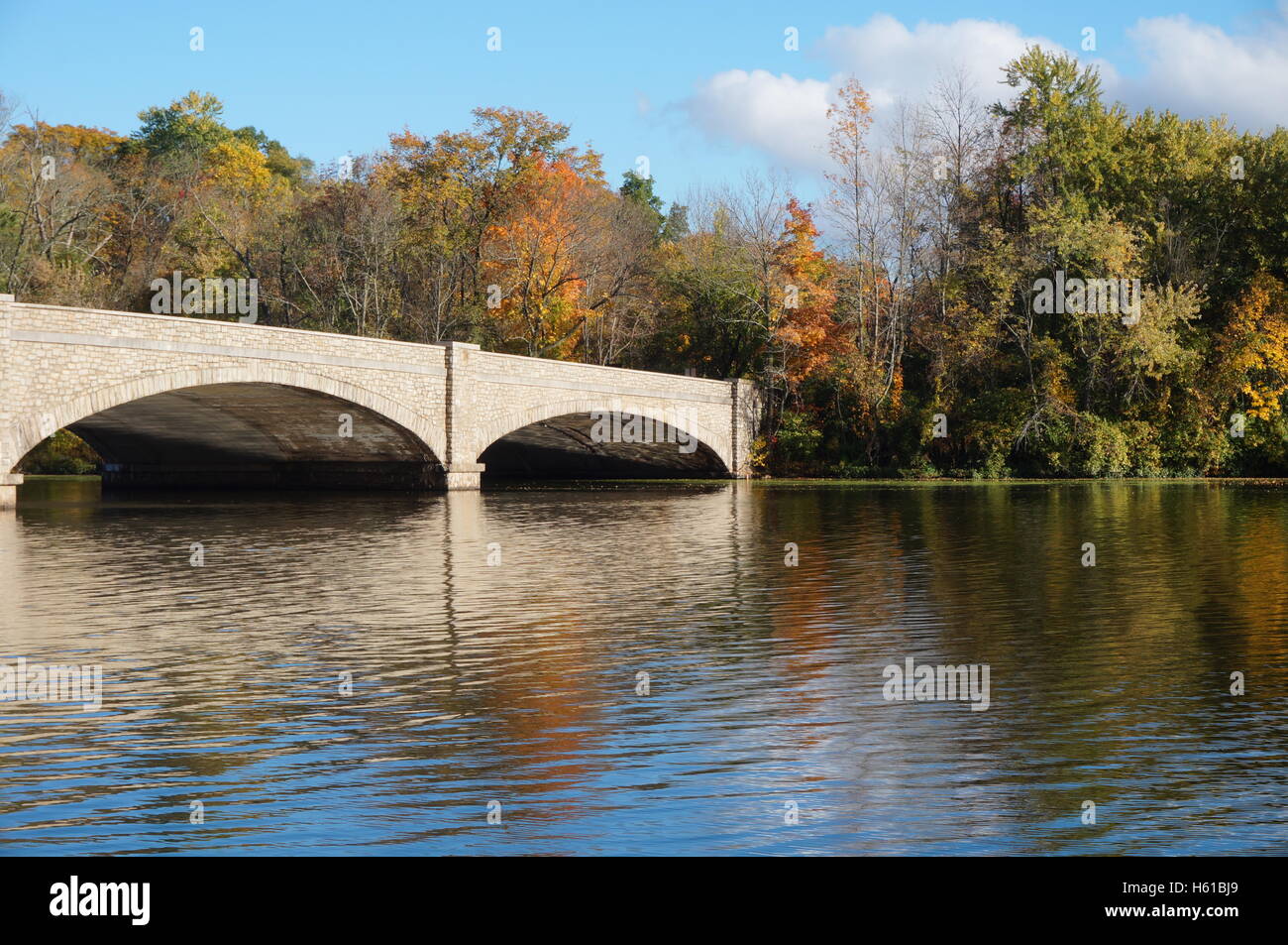 Fall foliage over the Washington Bridge on Lake Carnegie in Princeton ...