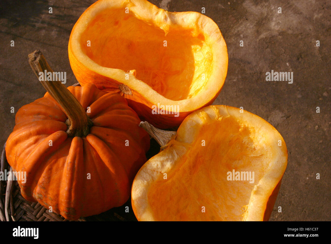 Pumpkin cut in half Stock Photo - Alamy