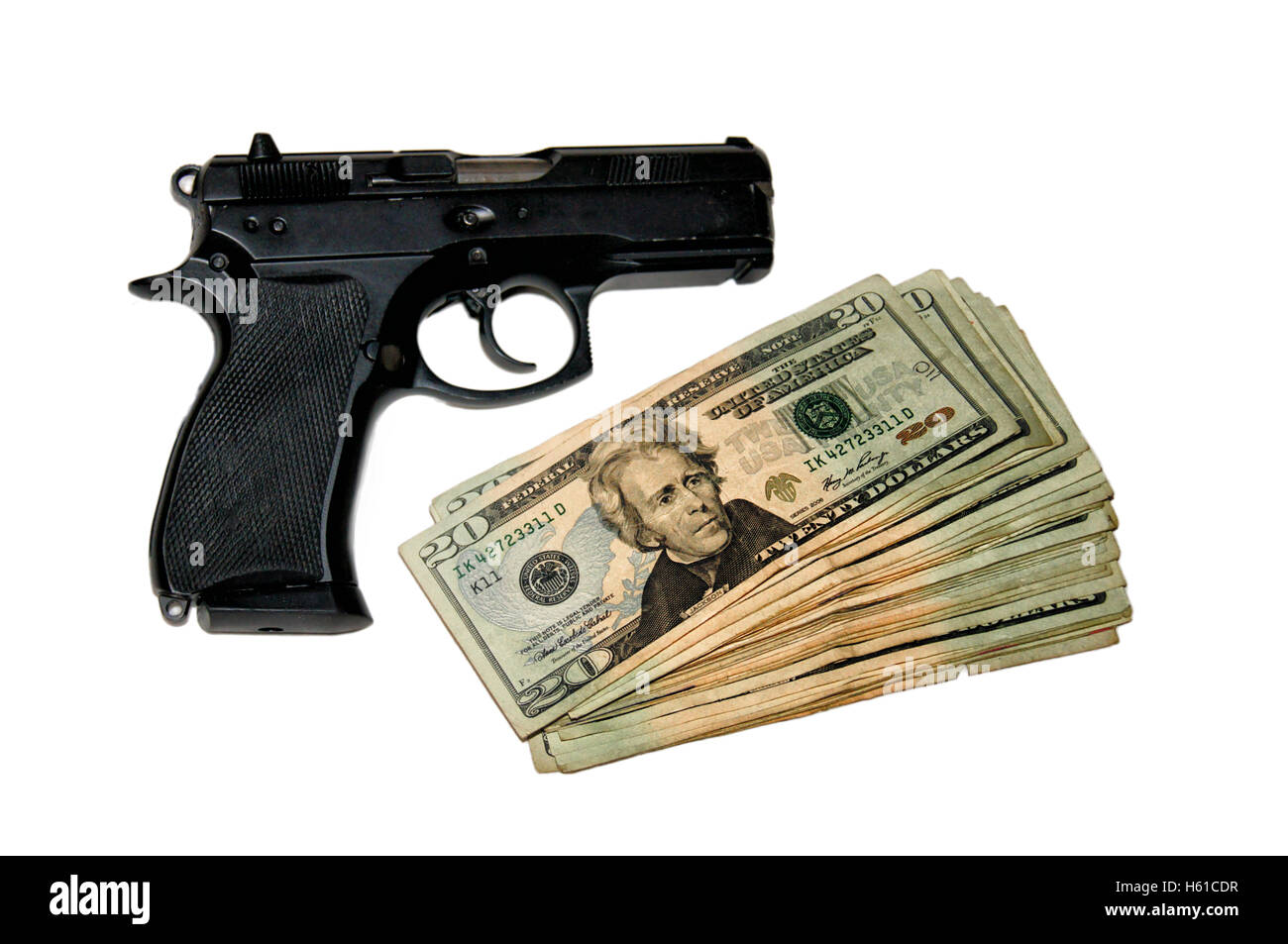 Gun and money hi-res stock photography and images - Alamy