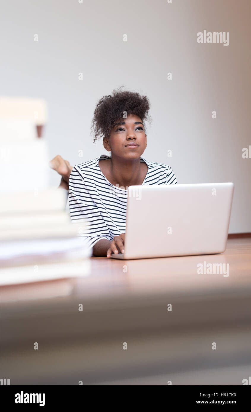 Black African American student girl using a laptop Stock Photo - Alamy