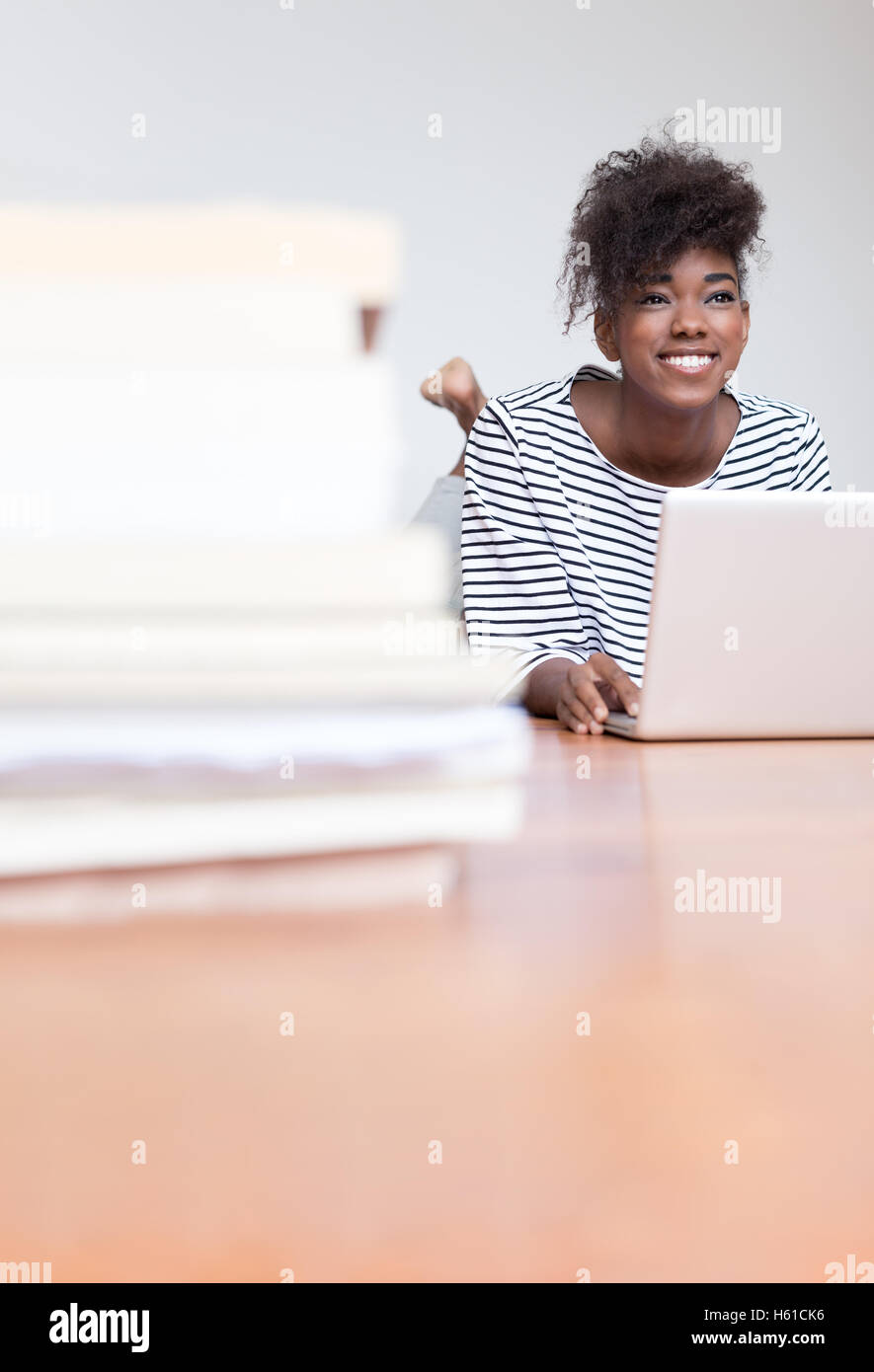 Black African American student girl using a laptop Stock Photo - Alamy