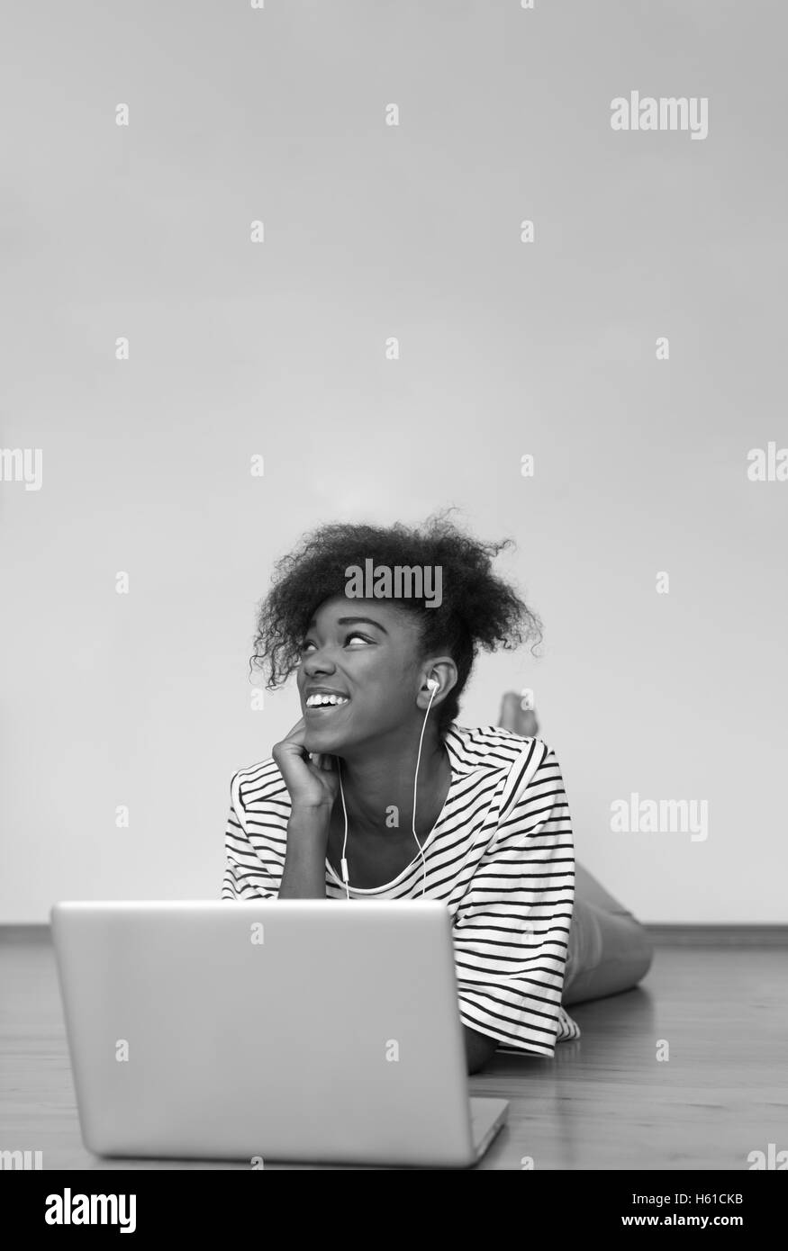 Black African American student girl using a laptop Stock Photo - Alamy