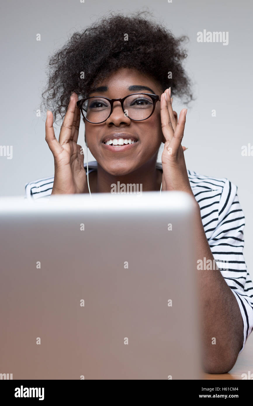 Black African American student girl using a laptop Stock Photo - Alamy