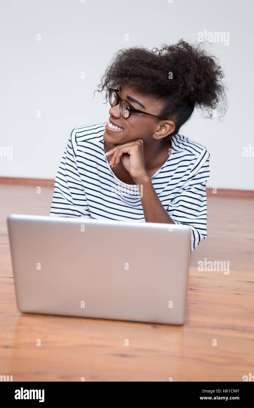 Black African American student girl using a laptop Stock Photo - Alamy