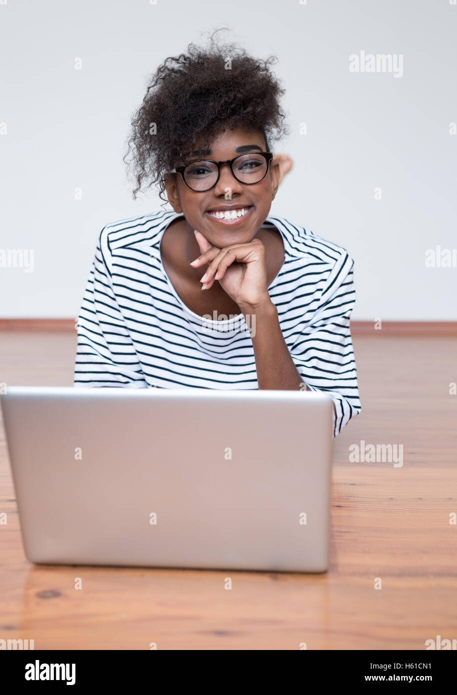 Black African American student girl using a laptop Stock Photo - Alamy