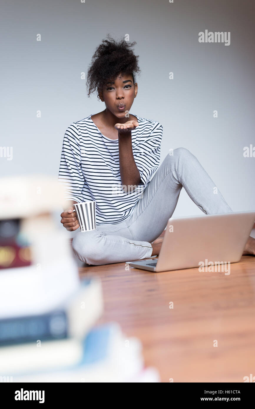 Black African American student girl using a laptop Stock Photo - Alamy