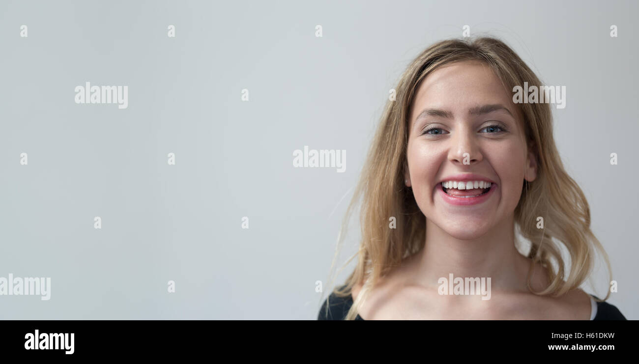 Face portrait of smiling woman. Teeth smiling girl. One model portrait ...