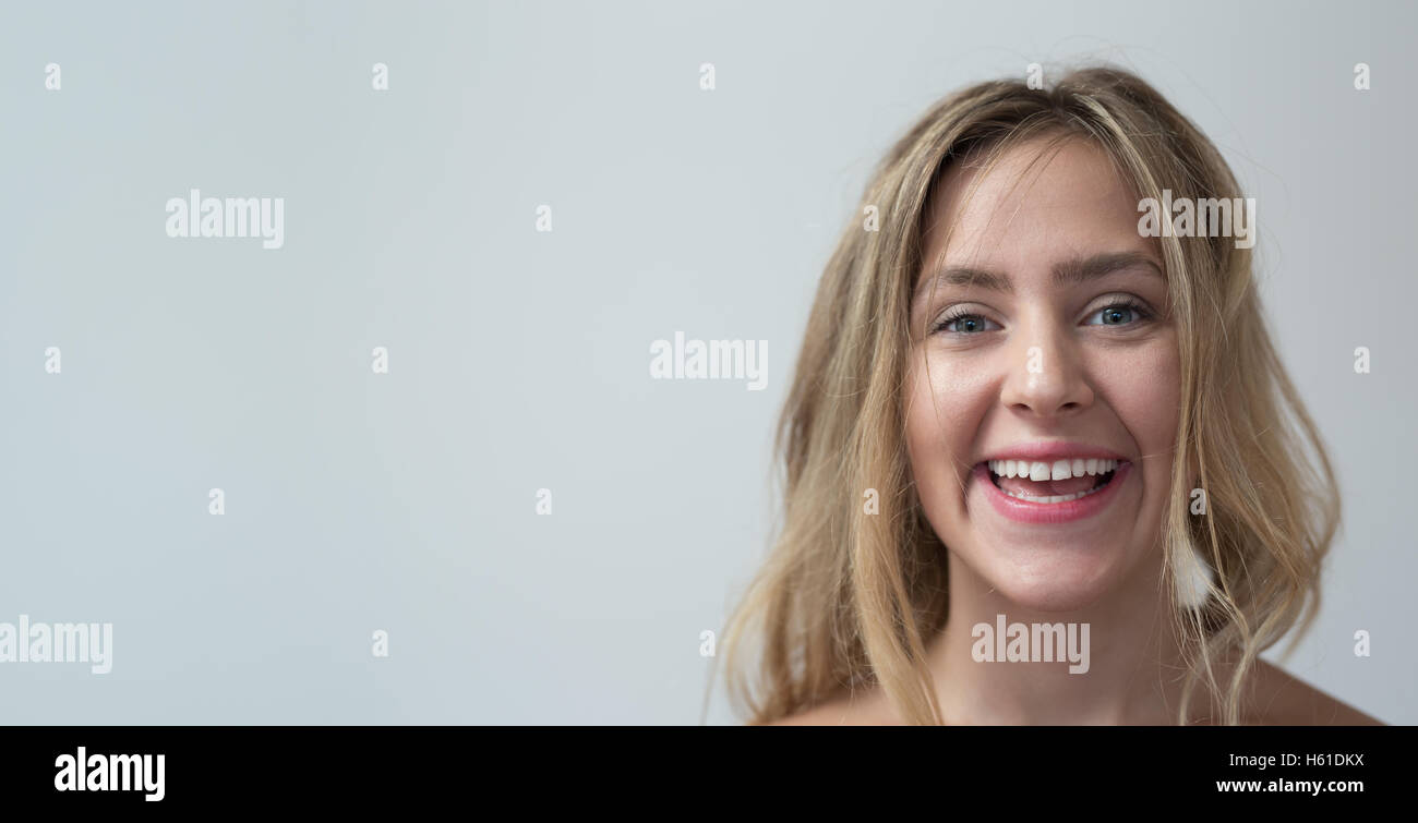 Face portrait of smiling woman. Teeth smiling girl. One model portrait ...