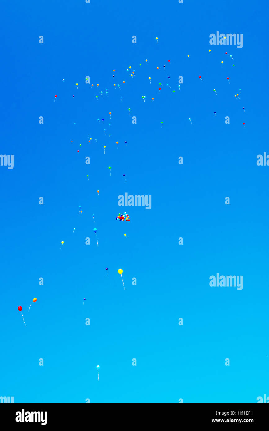 a lot of colorful balloons in blue sky Stock Photo - Alamy