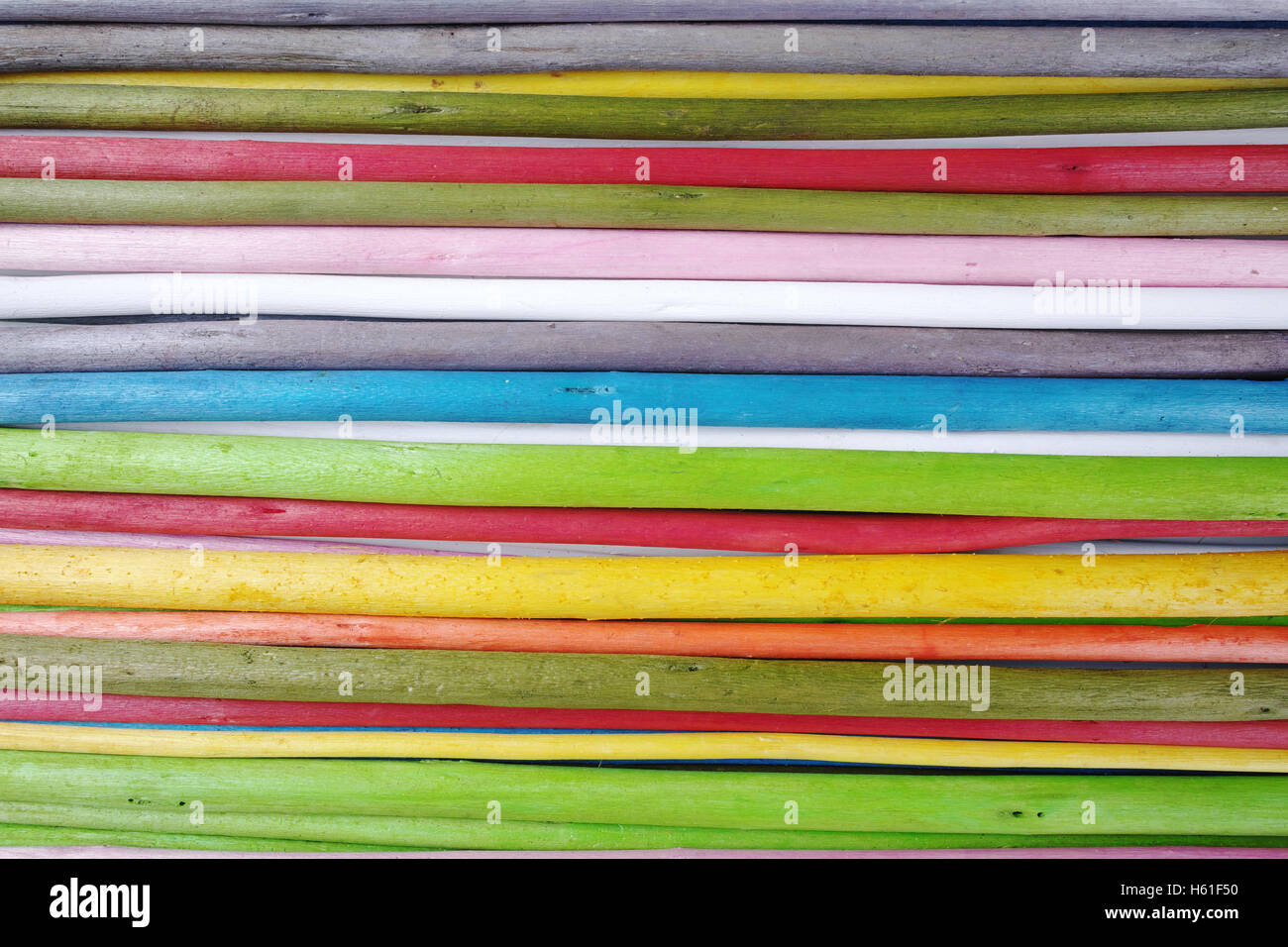 Decorative colorful wooden sticks on white background Stock Photo - Alamy
