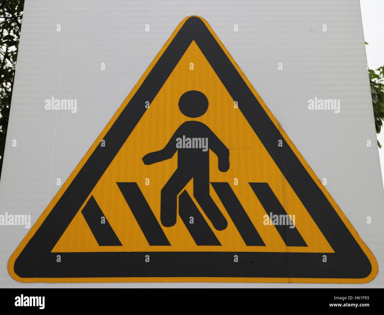 Yellow pedestrian crossing sign hi-res stock photography and images - Alamy
