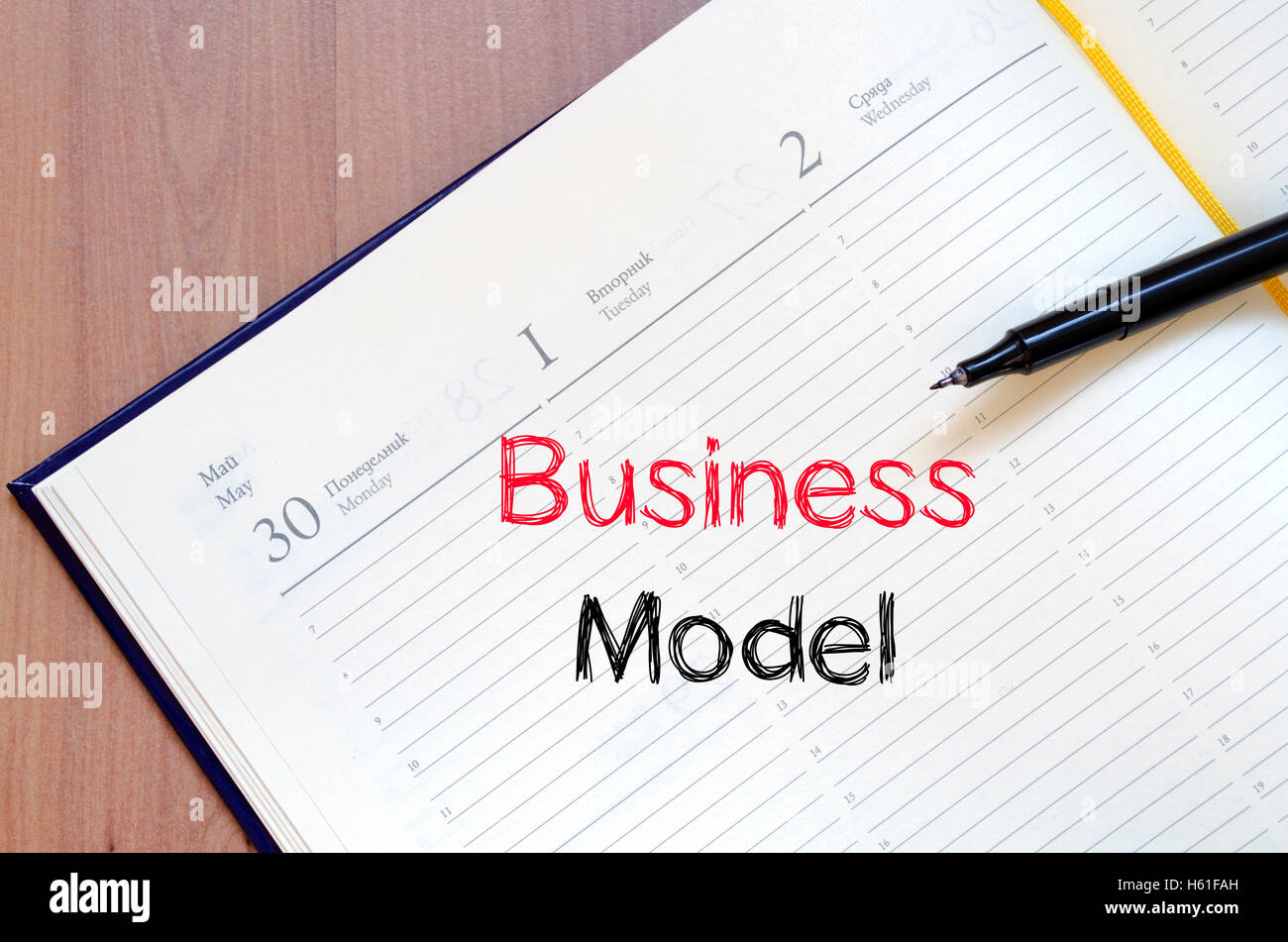 Business model text concept write on notebook Stock Photo - Alamy