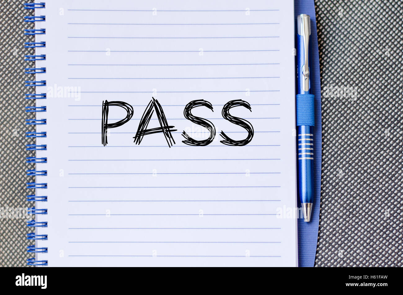 Pass text concept write on notebook Stock Photo - Alamy