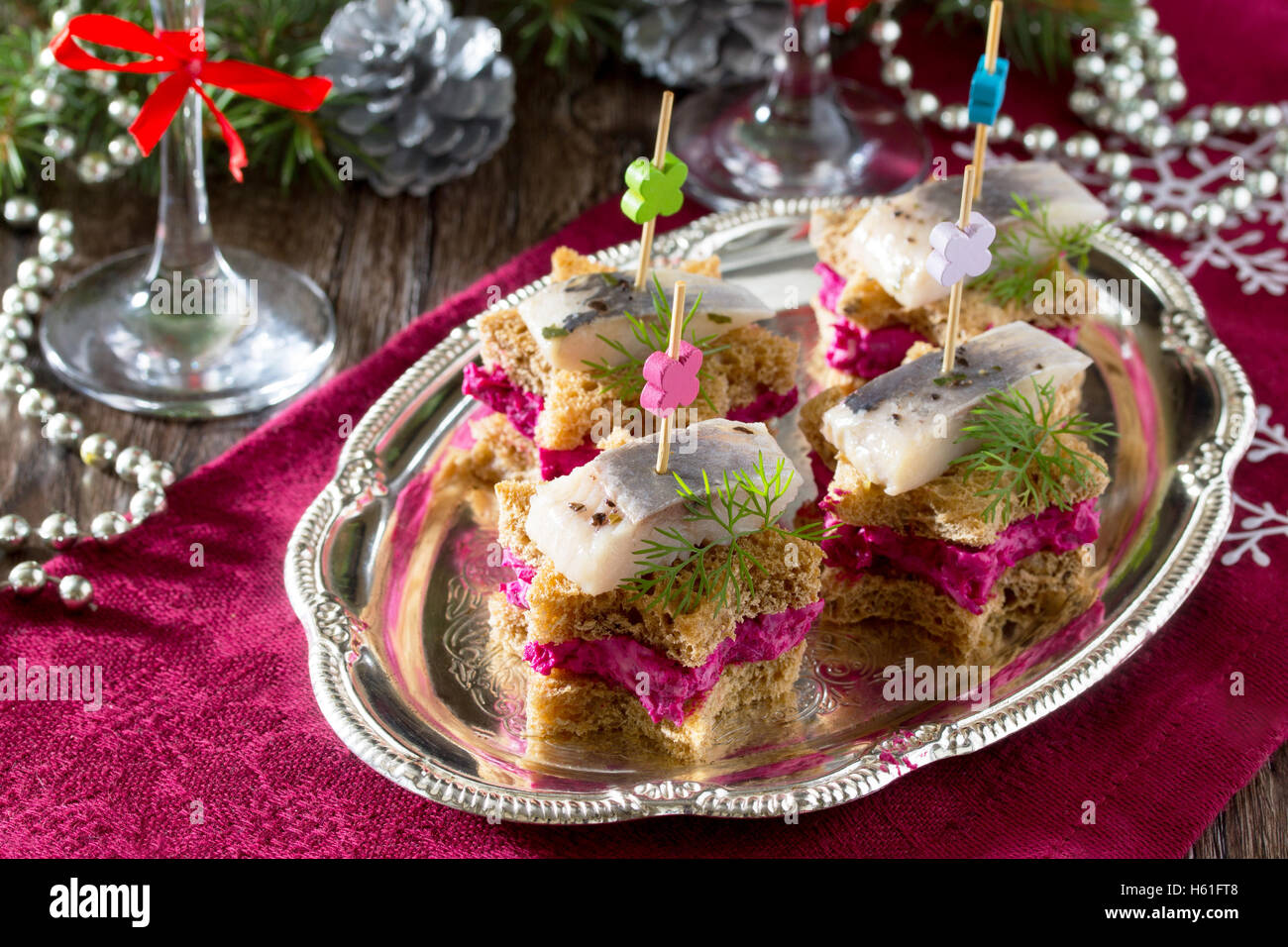 Holiday appetizer: Canapes in the form of a star with pickled herring ...